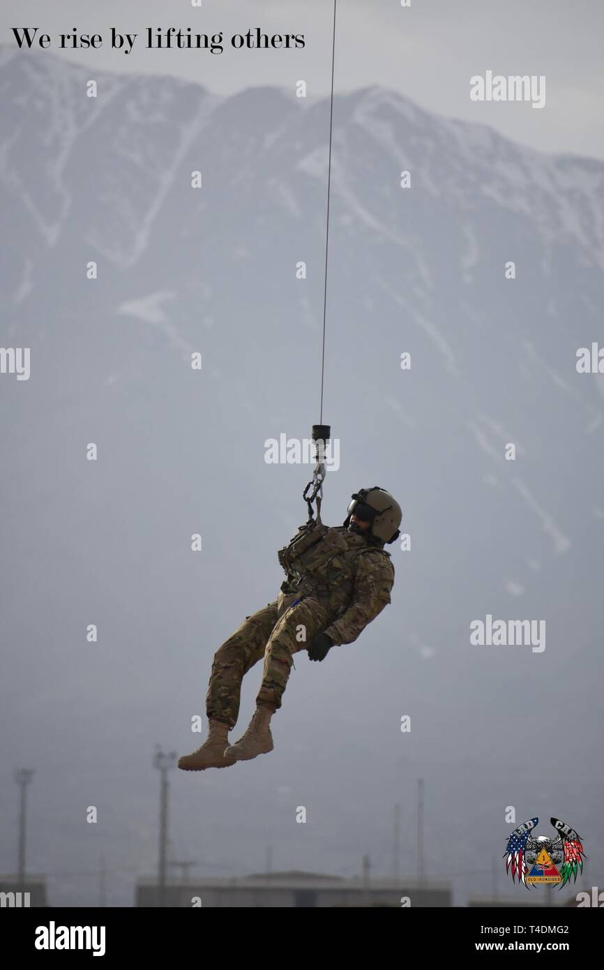U.S. Army Sgt. Ramon Pagan is hoisted during training in Afghanistan ...