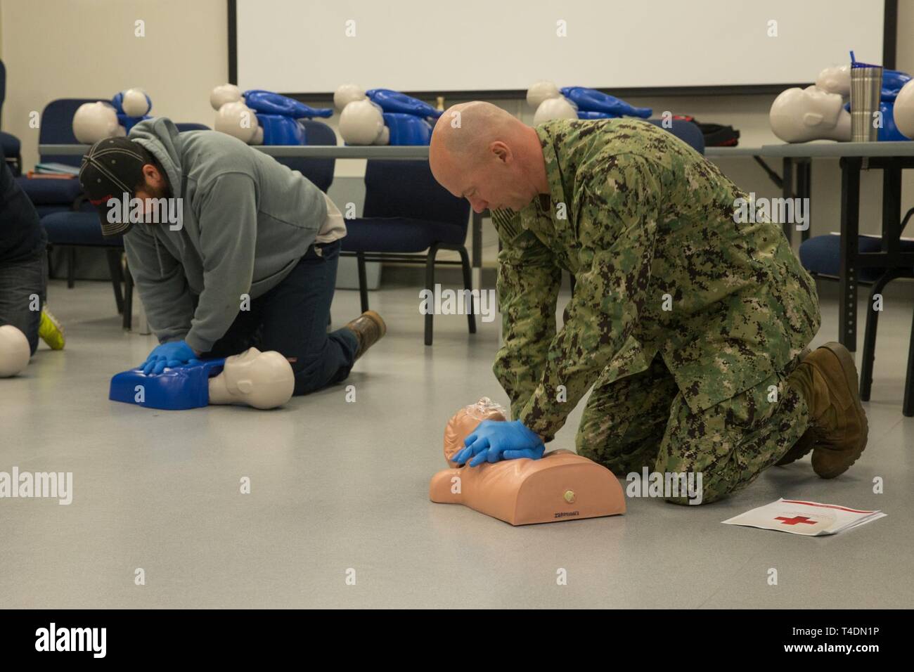 U.S. Navy Lt. Cmdr. Heath M. Clifford, an aerospace medical safety ...