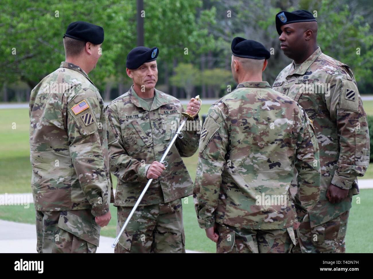 Incoming senior leader Command Sgt. Maj. Kirk Carlton acknowledges that ...