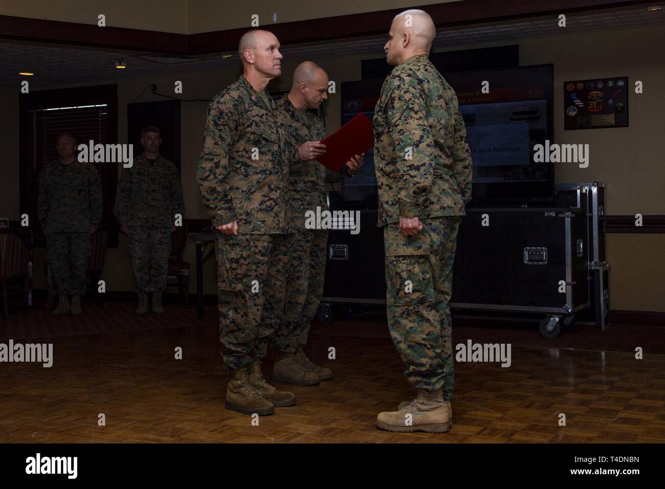 Col. Thomas A. Bruno, right, chief of staff, Marine Corps Installations ...