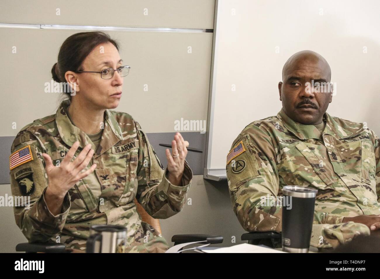 Col. Laura Calese (left), staff judge advocate, 101st Airborne Division ...