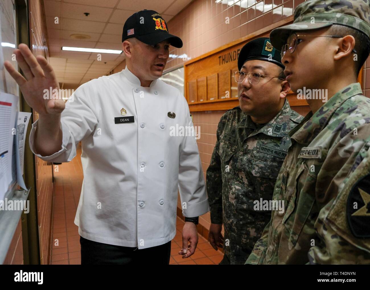 Republic of Korea Army (ROKA) Master Sgt. Yoo, Sung-hoon, middle ...