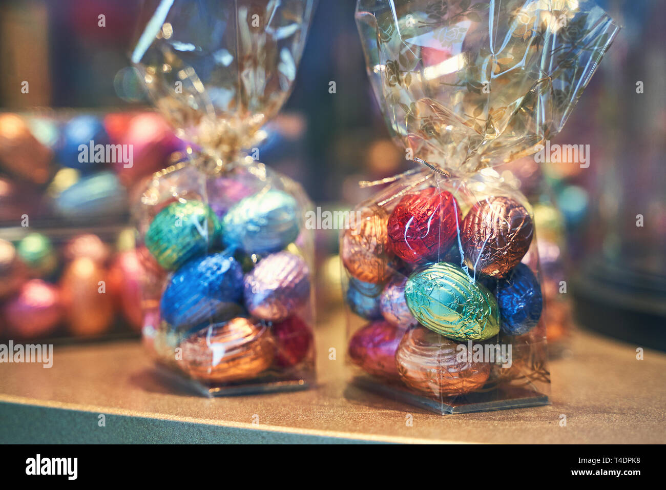 Traditional colorful Easter chocolate eggs in a confectionery ...