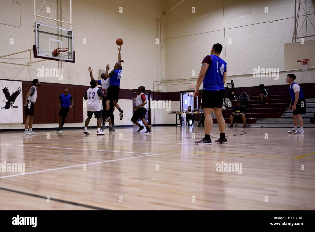 Members from the 4th Fighter Wing compete during the base basketball ...