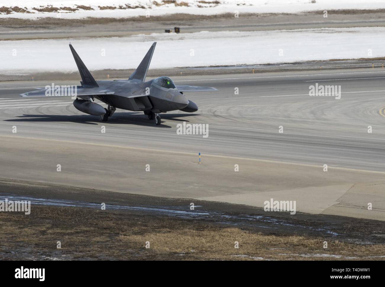 F-22 Raptors from the 3rd Wing and 477th Fighter Group participate in a ...