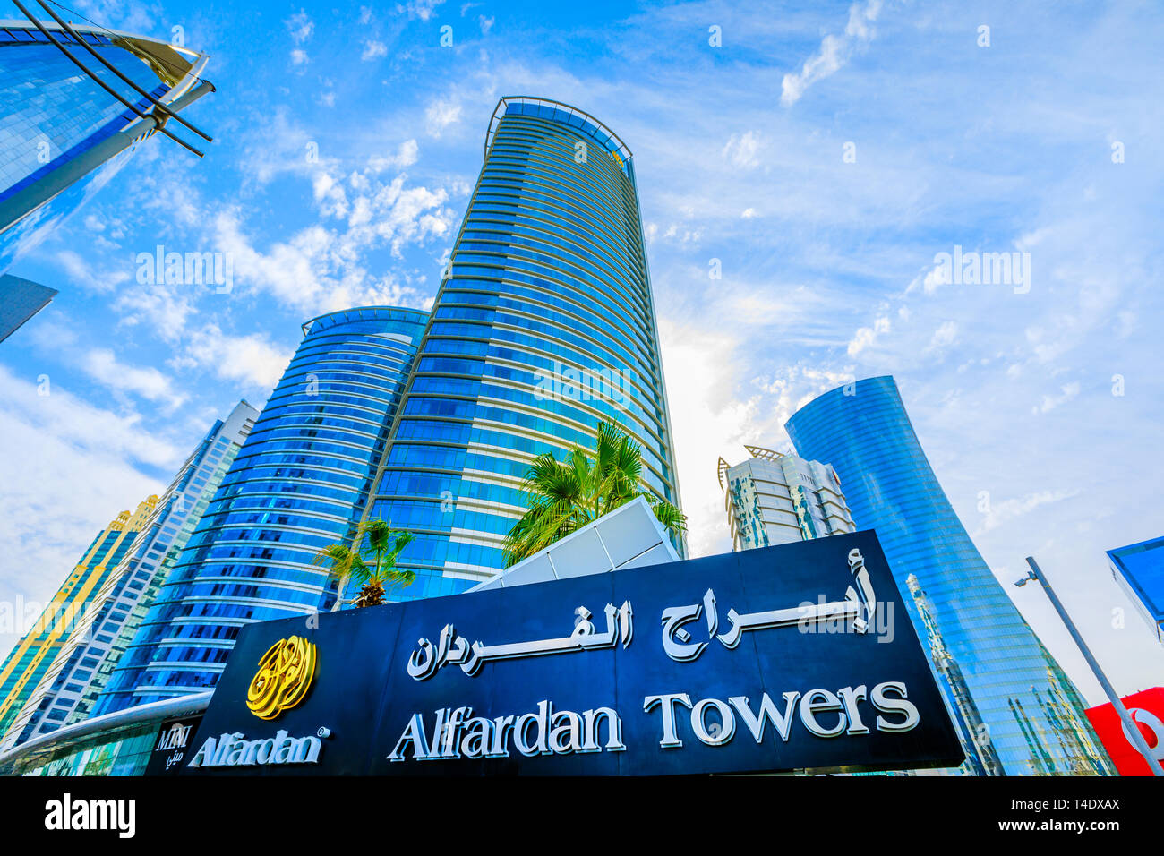 Doha, Qatar - February 17, 2019: bottom view of Alfardan Towers in West ...