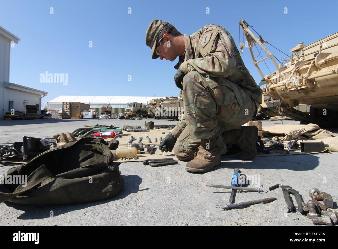 U.S. Army Spc. David Graham, a tank crew member assigned to Charlie ...