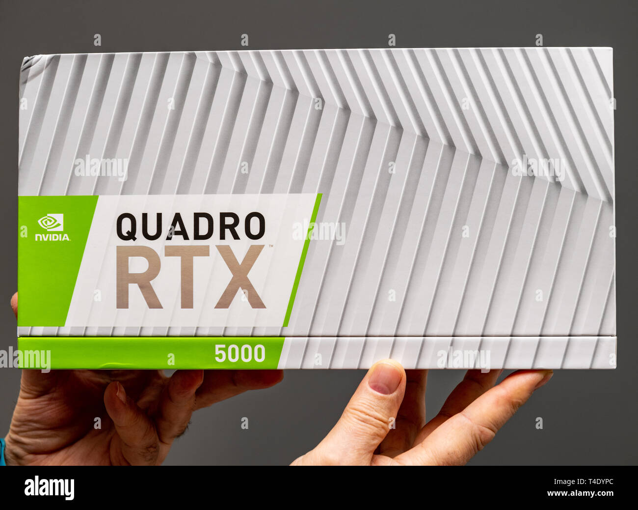 Paris; France - Mar 28 2019: Senior man showing cardboard boxes before ...