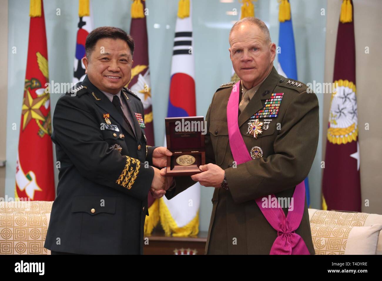 Commandant of the Marine Corps Gen. Robert B. Neller poses for a photo ...