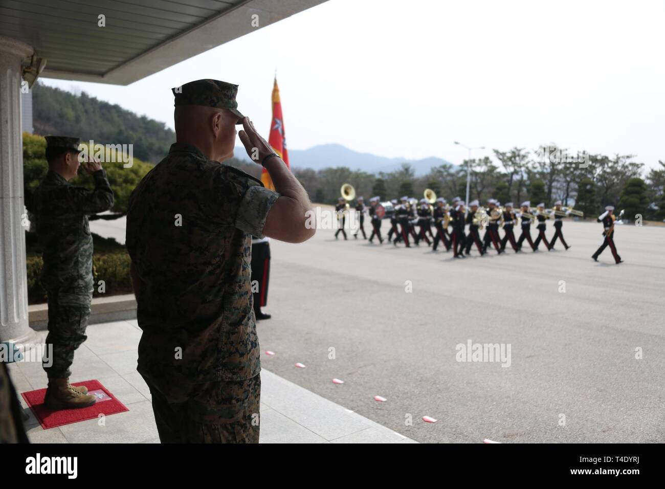 Commandant of the Marine Corps Gen. Robert B. Neller salutes troops ...