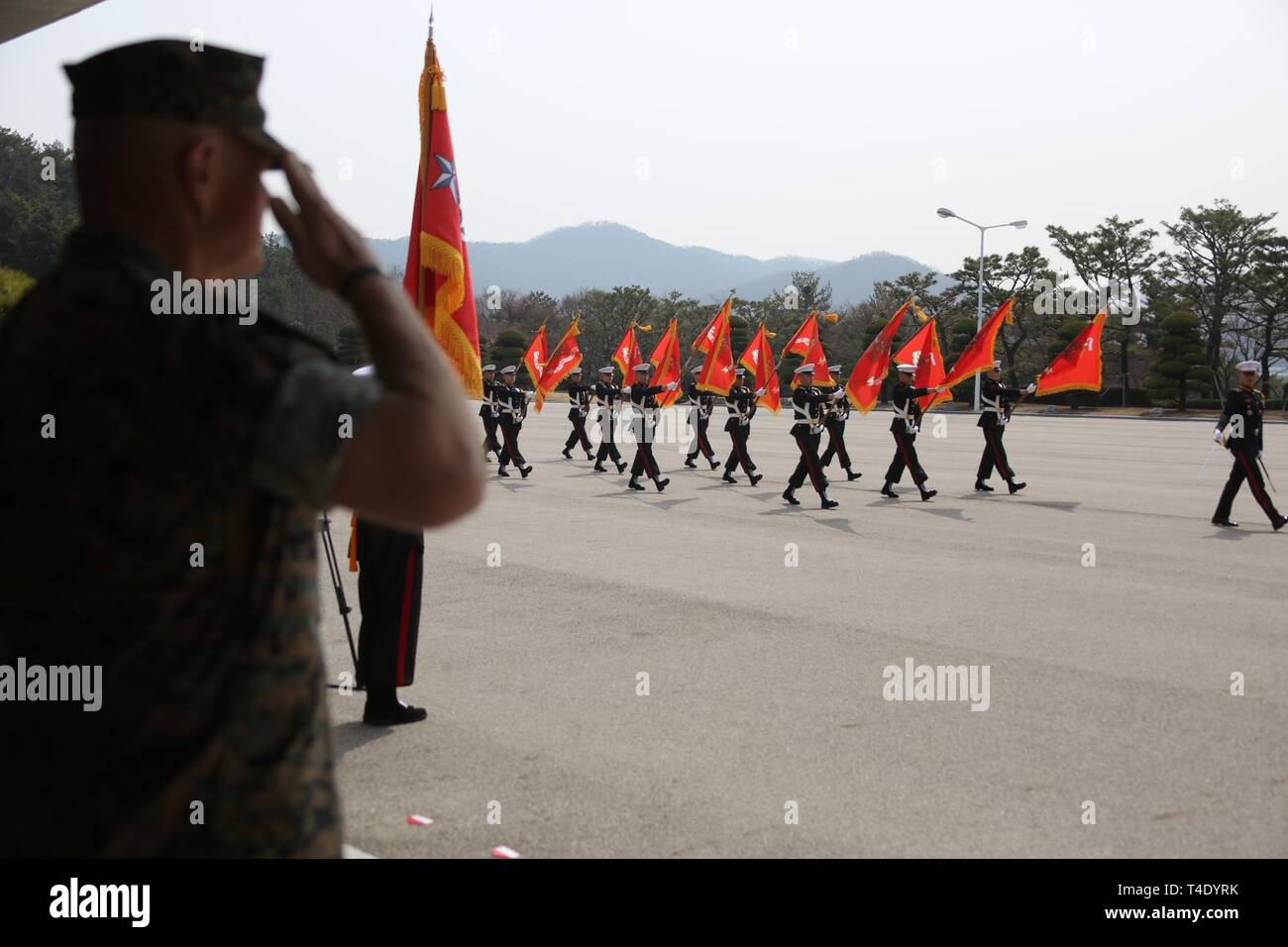 Commandant of the Marine Corps Gen. Robert B. Neller salutes troops ...