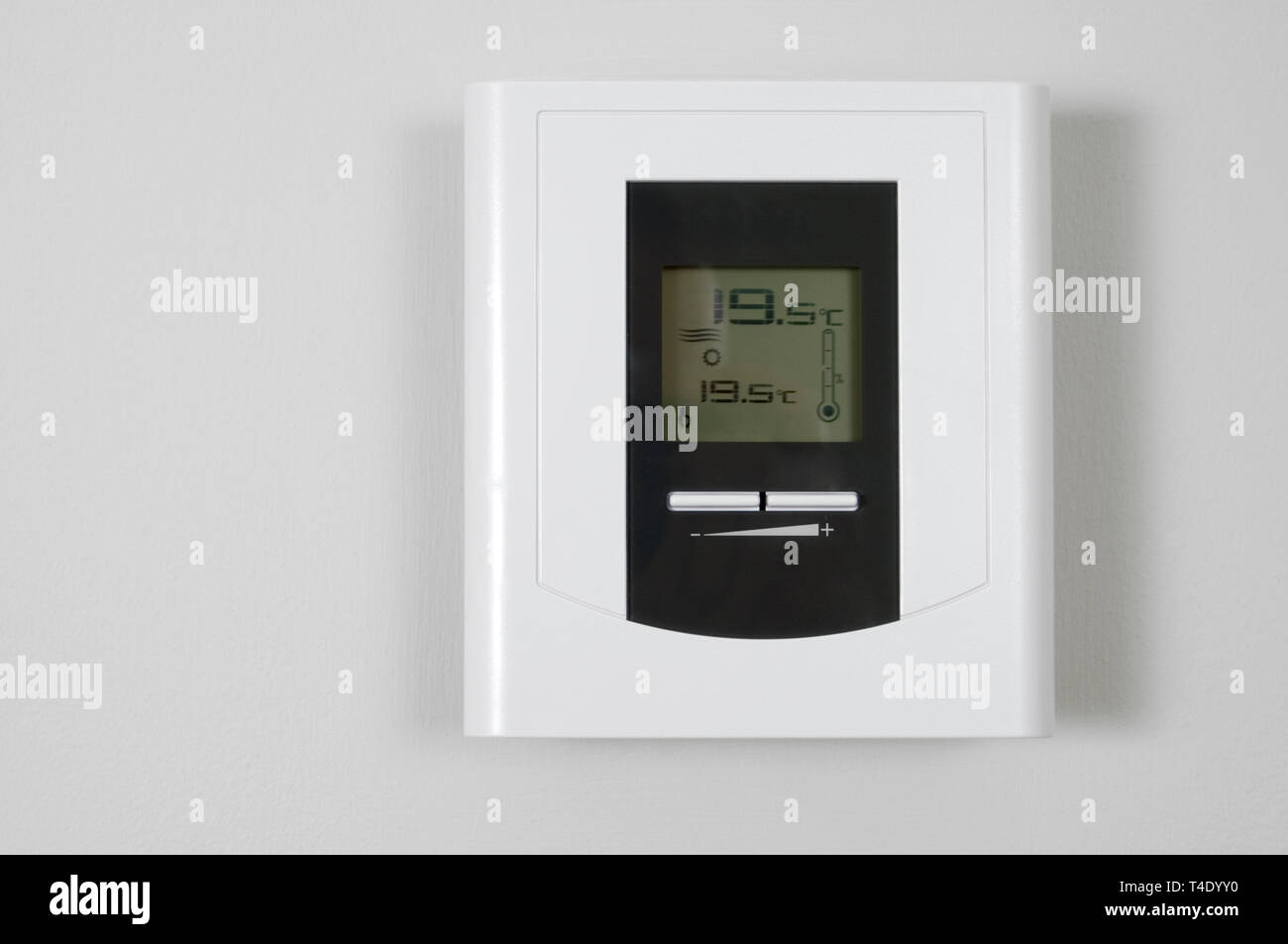 White Digital Thermostat for Heating Control Stock Photo - Alamy