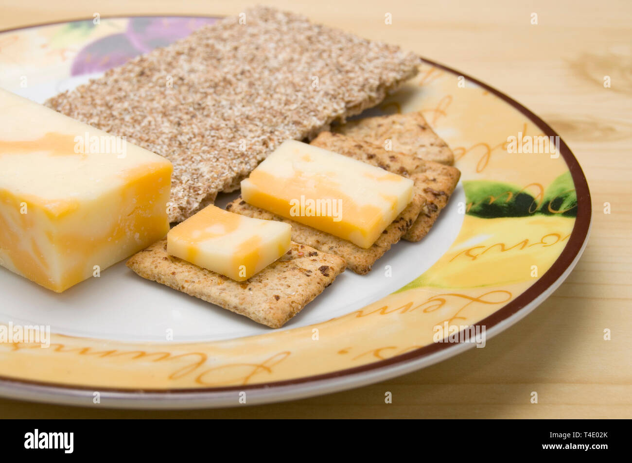 Side View of Healthy Snack of Crackers and Cheese Stock Photo - Alamy
