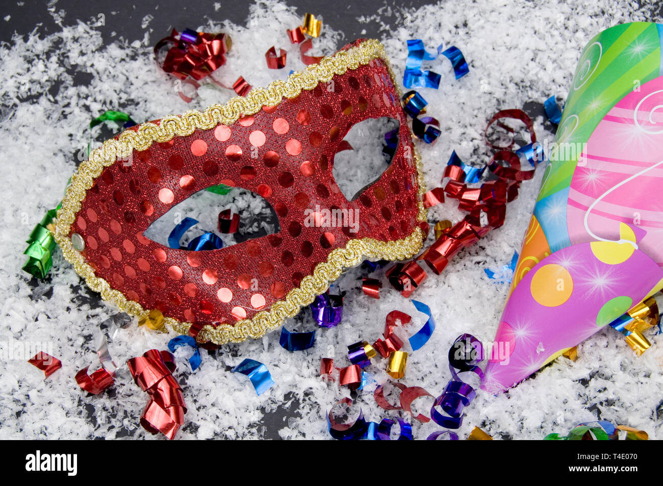 Masquerade Red Party Masks and Hats Stock Photo - Alamy