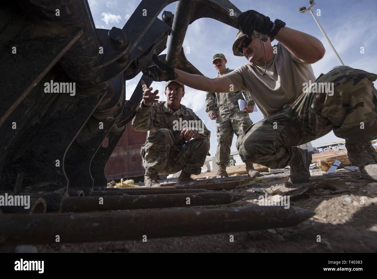 Tech. Sgt. John Beckett, left, 379th Expeditionary Civil Engineer ...