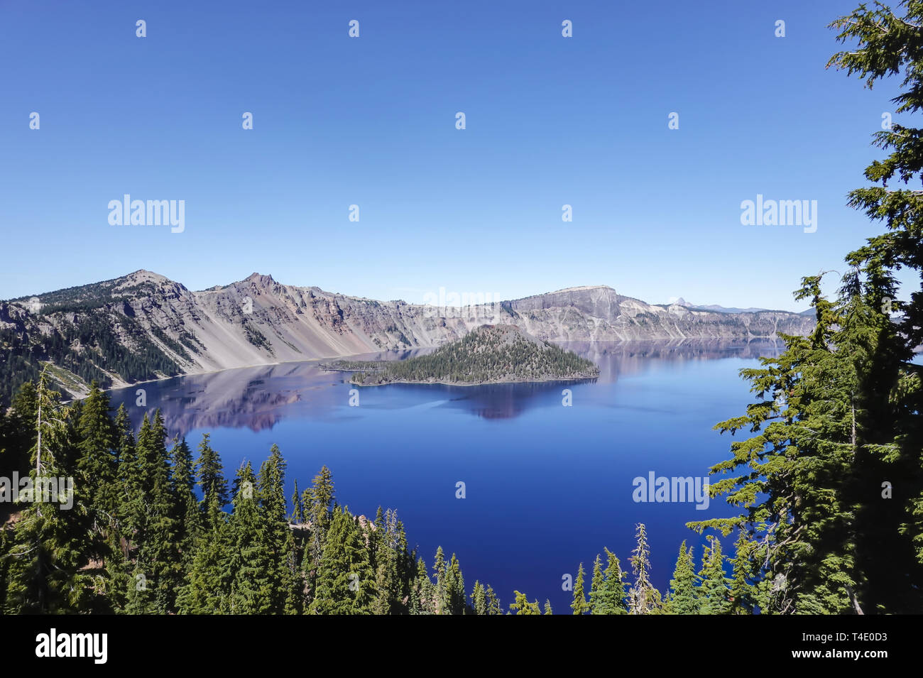 A view of the beautiful clear Crater Lake showing the deep blue water ...