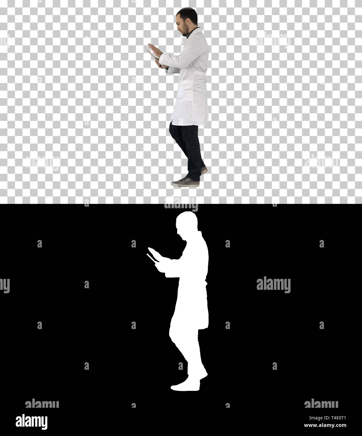 Doctor using tab while walking, Alpha Channel Stock Photo - Alamy