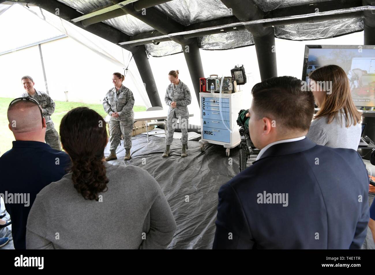 Tech Sgt. John Sessums, Senior Master Sgt. Wendy Beltran Del Rio, and ...