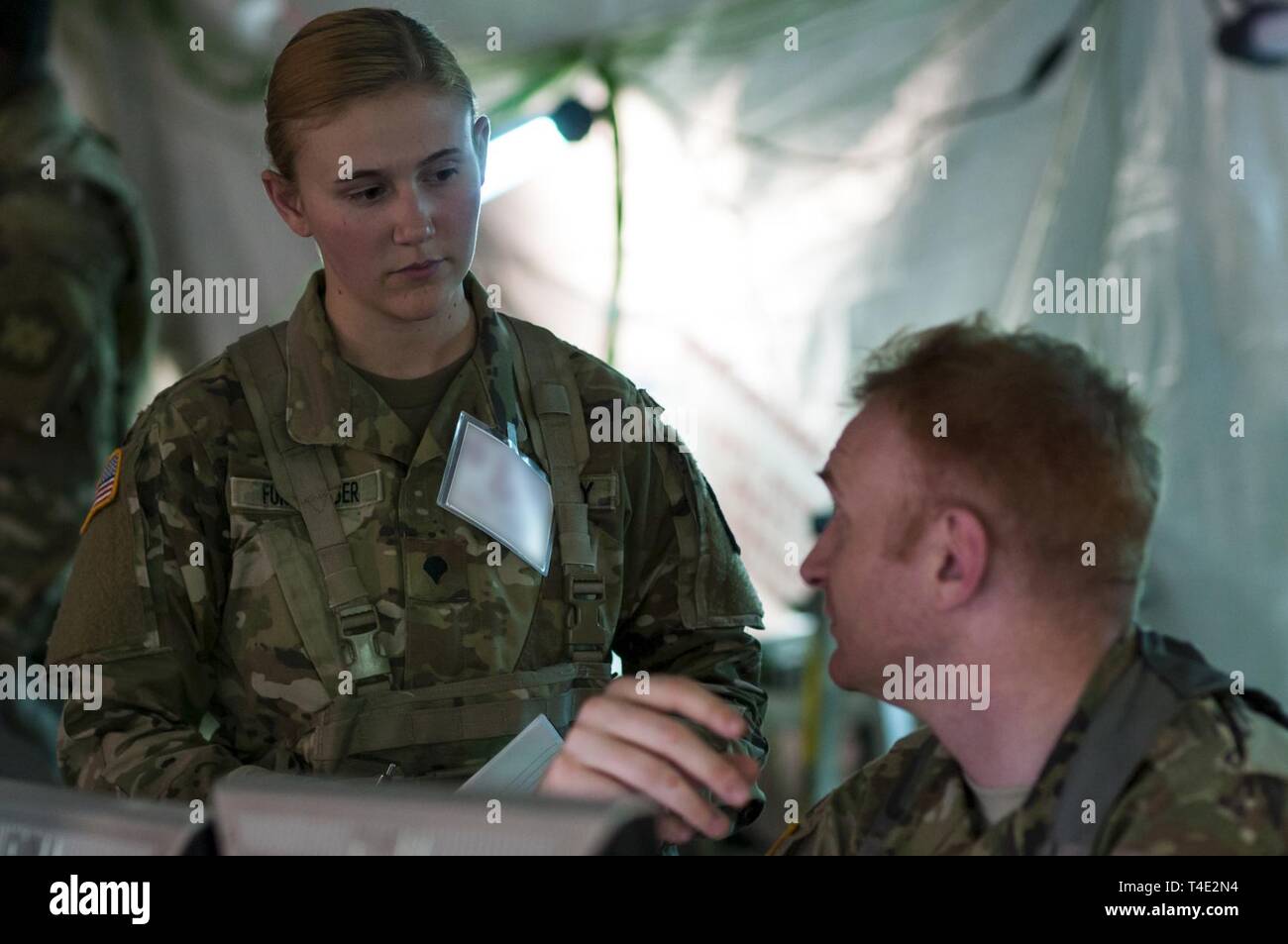 Spc. Courtney Funkhouser, an intelligence specialist with the 55th ...