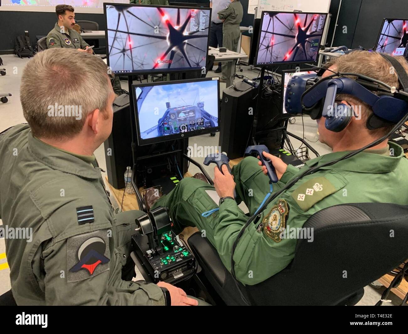 Royal Air Force Flight Lt. Darren French (left), Pilot Training Next 2. ...
