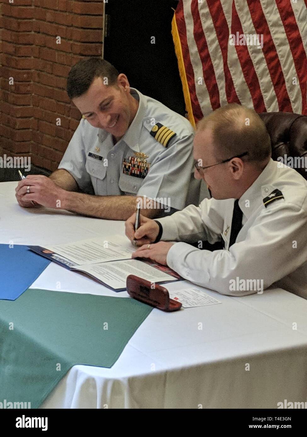 Capt. Gregory C. Rothrock (left), Commander of the U.S. Coast Guard ...