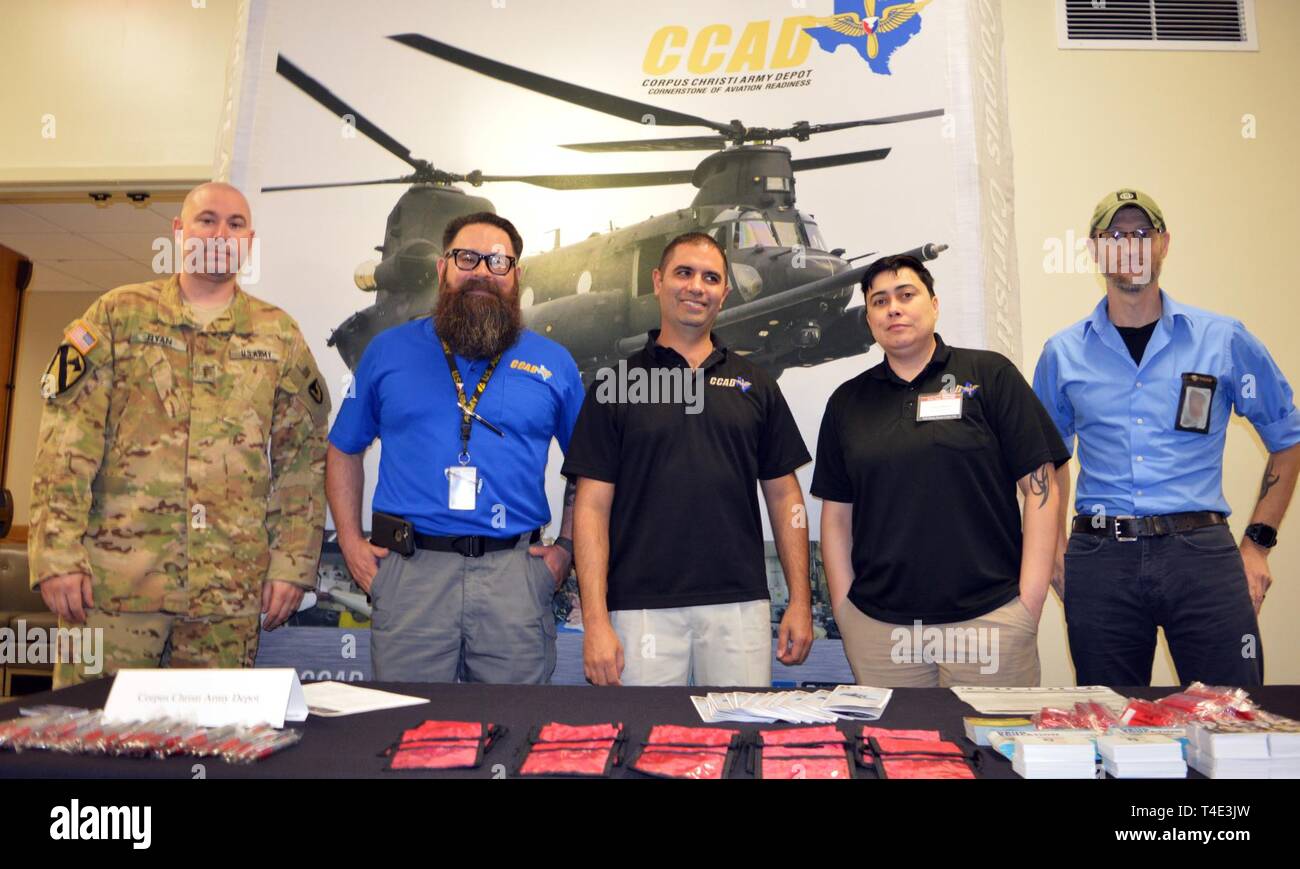 Corpus Christi Army Depot employees pose for a photo around the CCAD ...