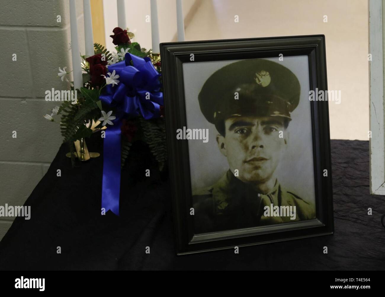 A portrait of U.S. Army Pfc. Clifford M. Mills, formerly a member of the 319th Glider Field ...