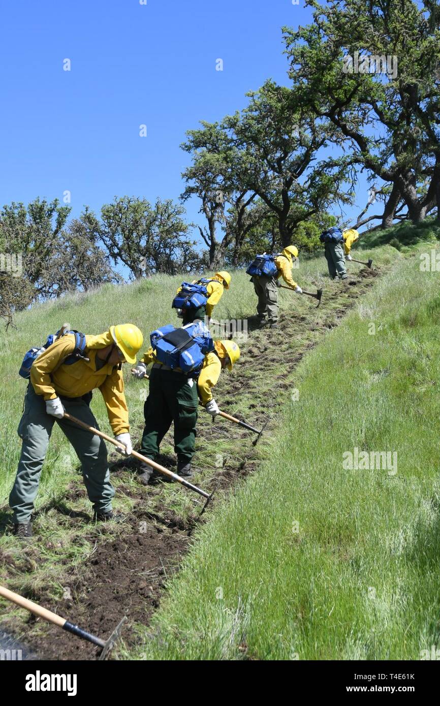 Cal Guard Soldiers practice using McLeod wildland firefighting tools ...