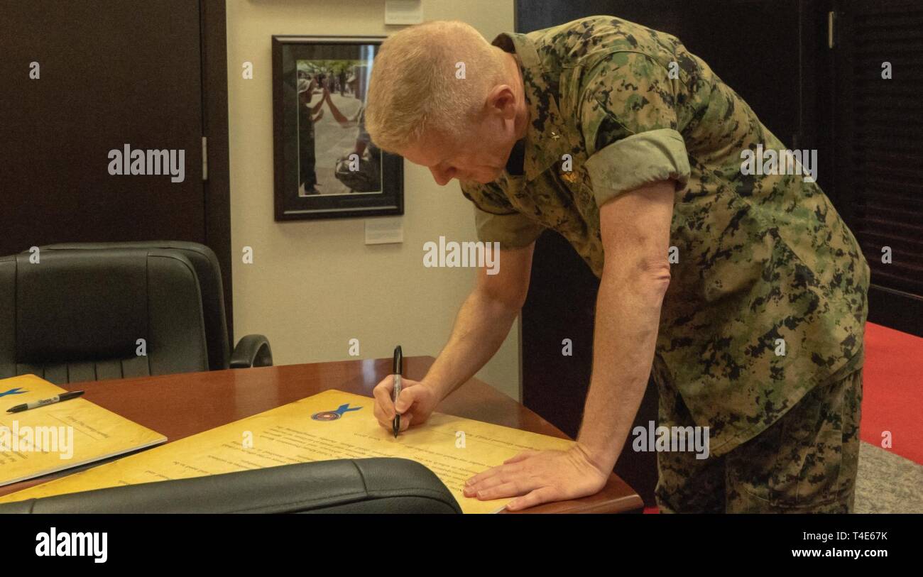 Brig. Gen. Paul Rock Jr. signs the 2019 Child Abuse Prevention ...