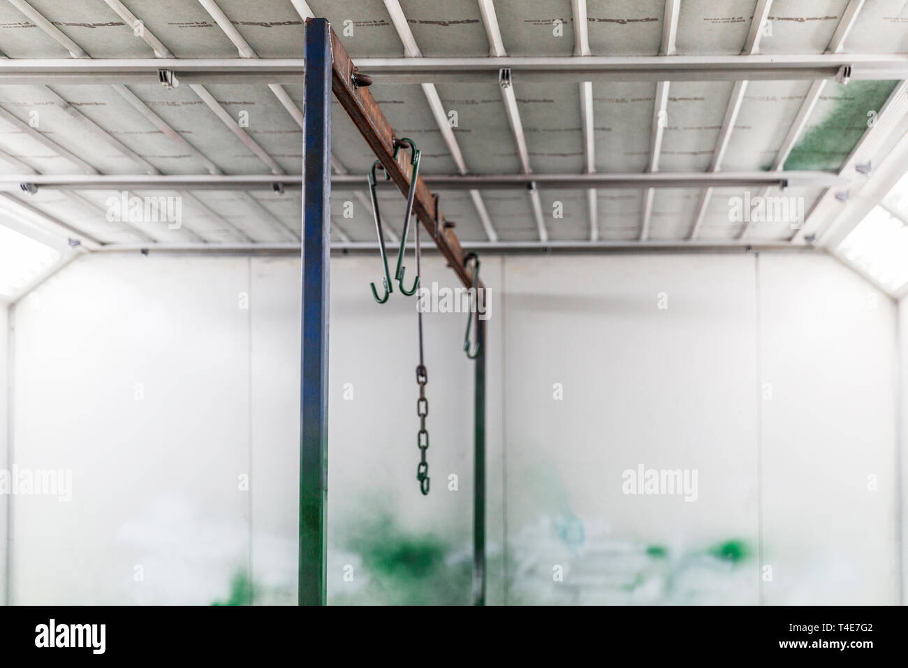 Spray booth steel hanger ready for use Stock Photo - Alamy
