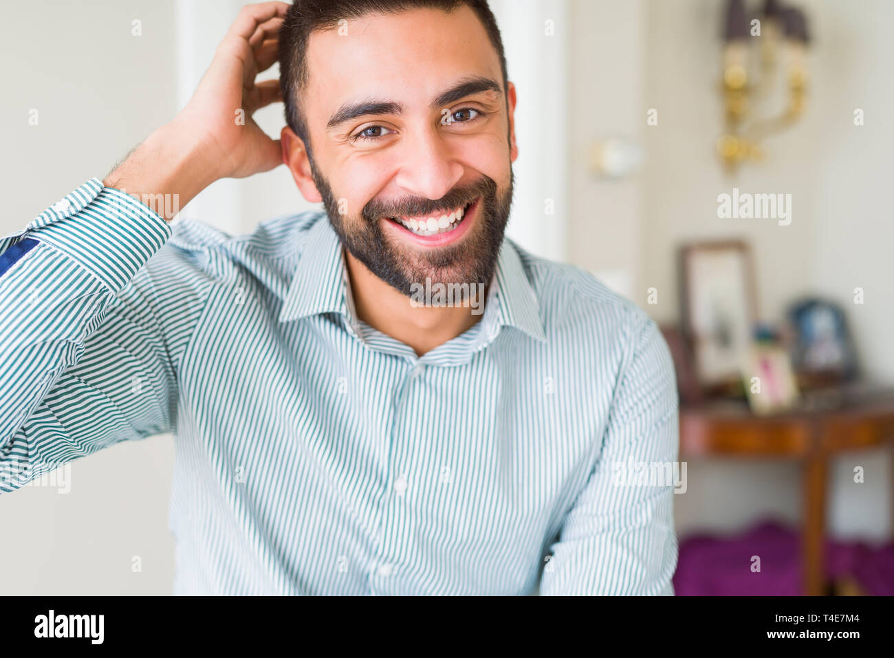 Handsome man smiling cheerful with a big smile on face showing teeth ...