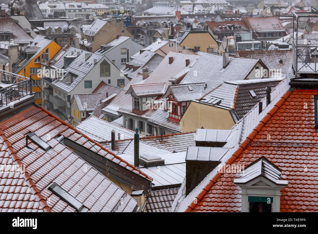 Rooftop with Snow in Switzerland Stock Photo - Alamy