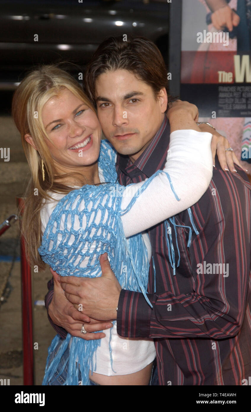 LOS ANGELES, CA. April 07, 2004: Actress ALISON SWEENEY & actor BRYAN ...