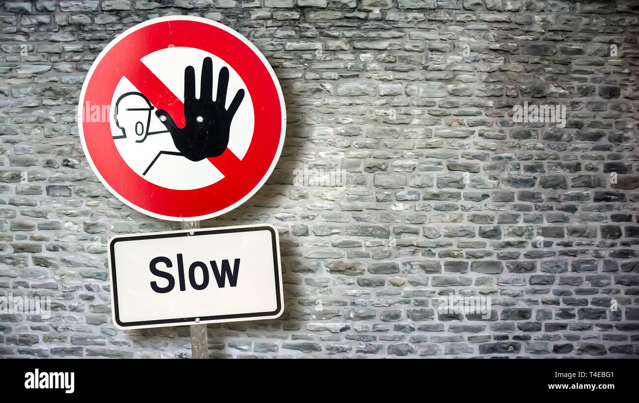 Street Sign Fast versus Slow Stock Photo - Alamy