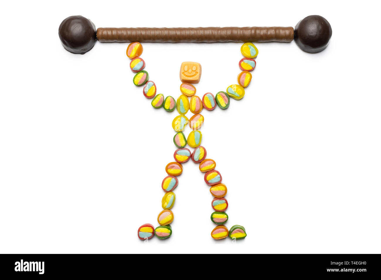 Sweetness benefits concept, isolated. Little man made from candy with ...