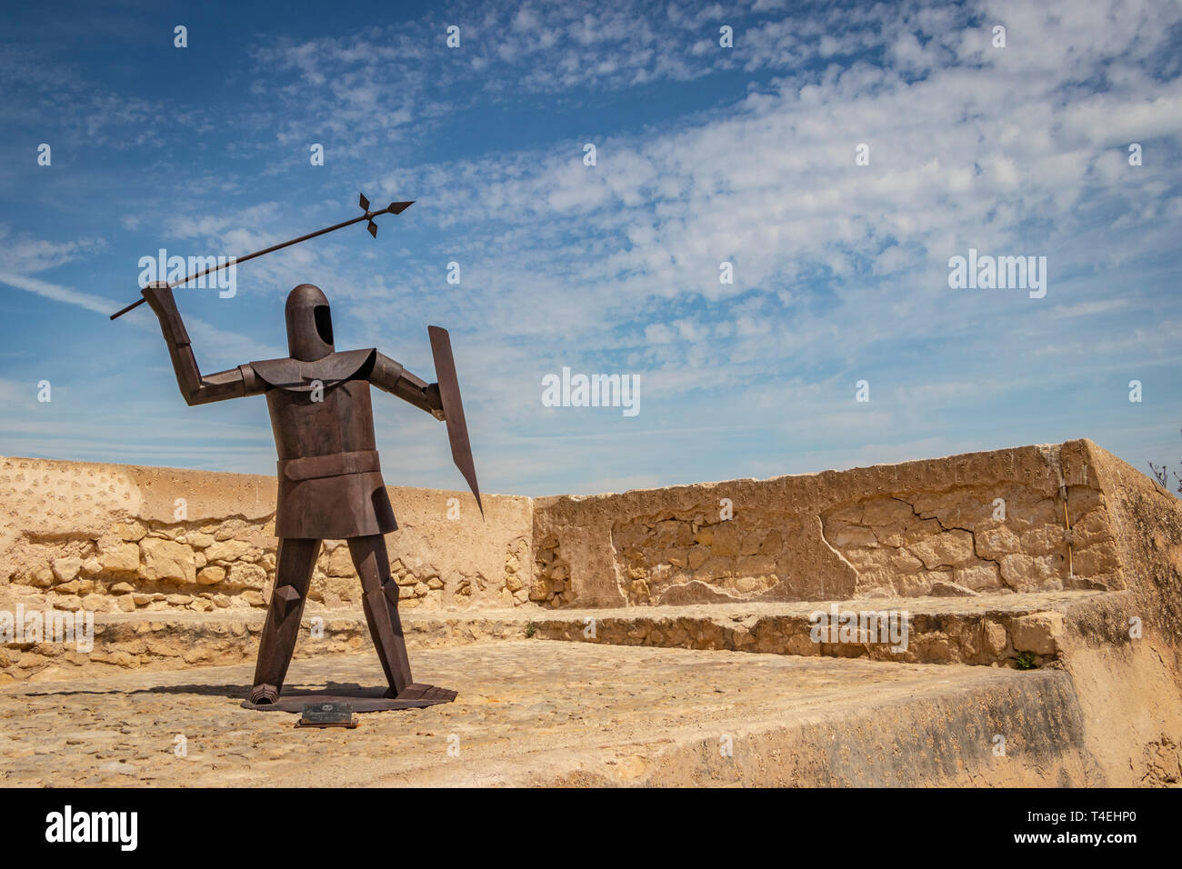 steel sculpture of a medieval soldier throwing a spear at castell de la ...