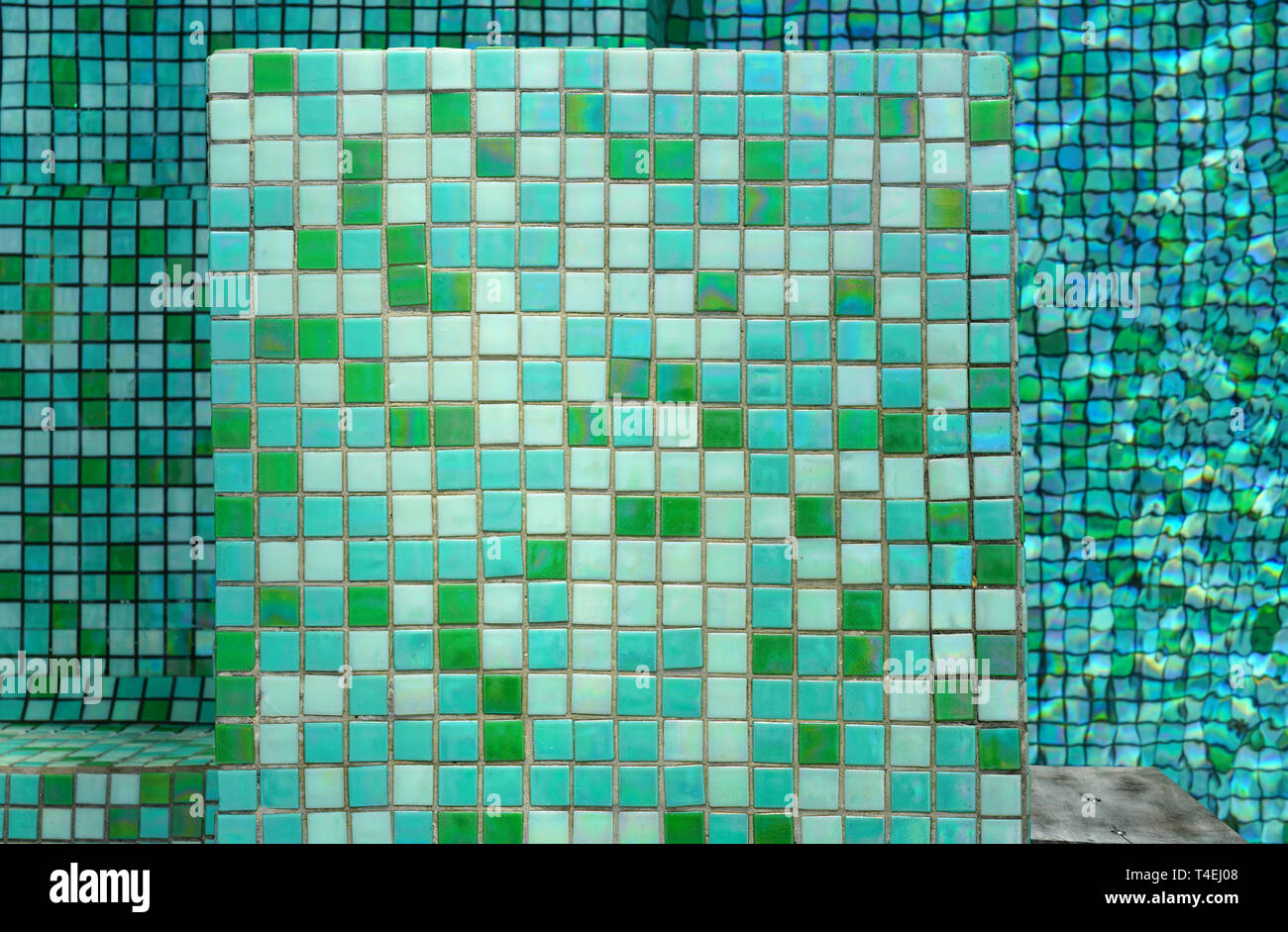 Mixed blue colored square tile mosaic background underwater in a ...