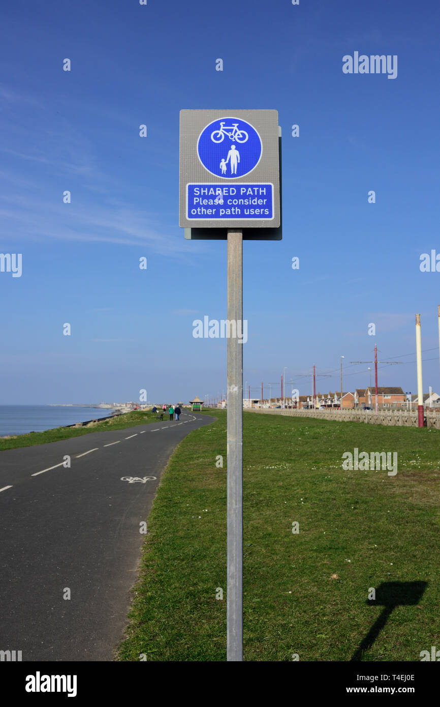 Shared path please consider other path users sign, mounted on grass ...