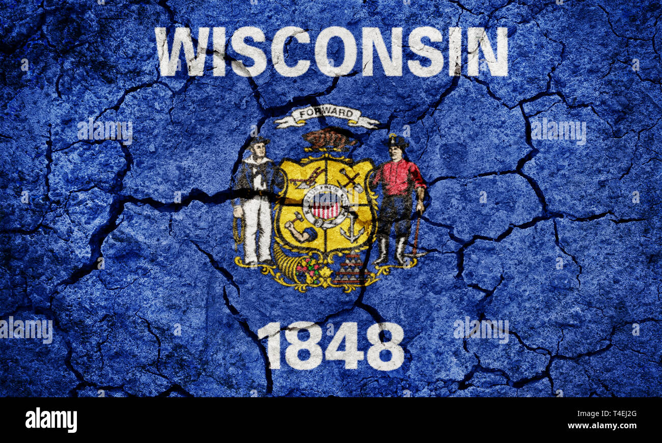 Flag of the state of Wisconsin on dry earth ground texture background ...
