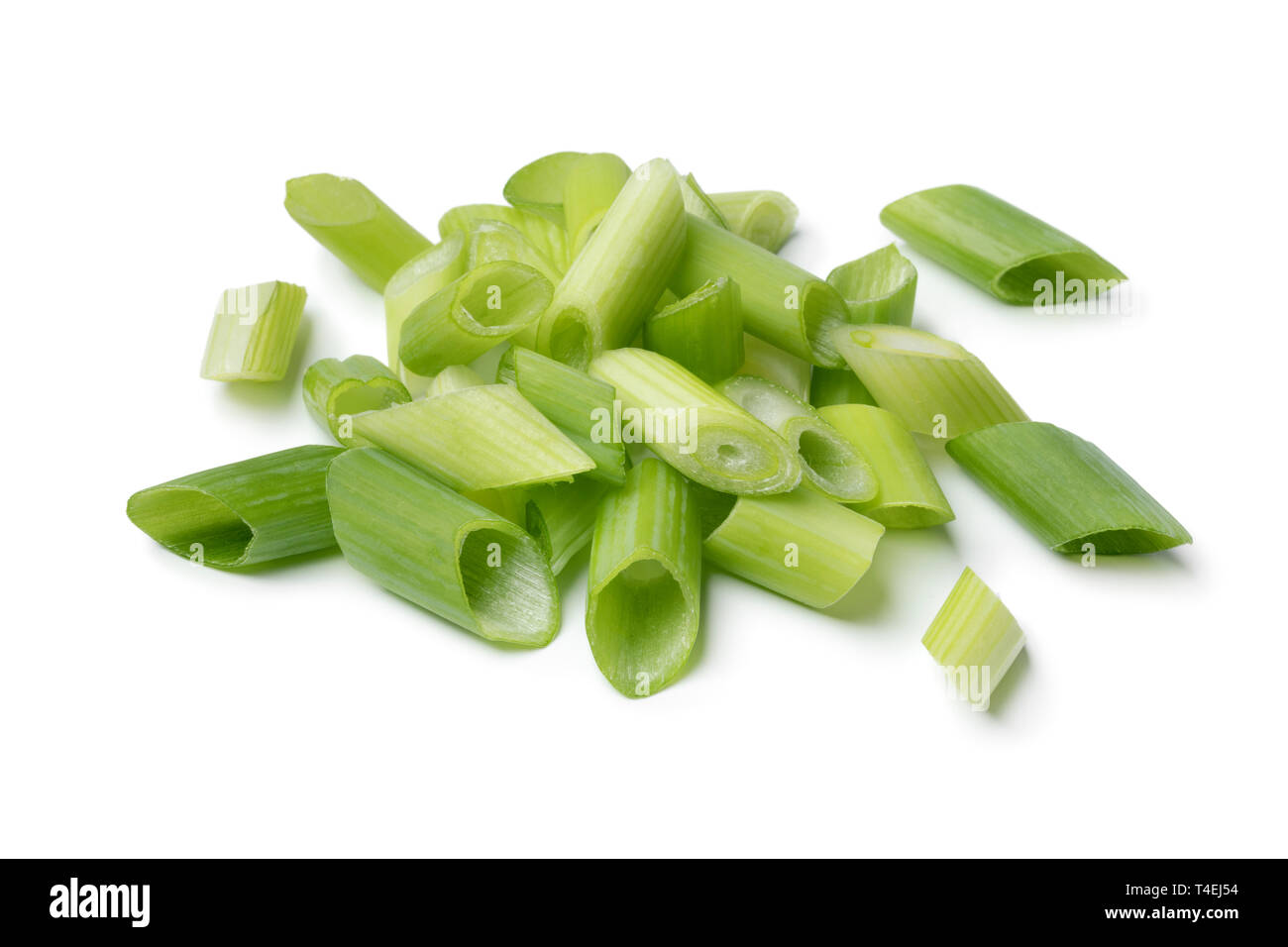Heap of fresh cut spring onions isolated on white background Stock ...