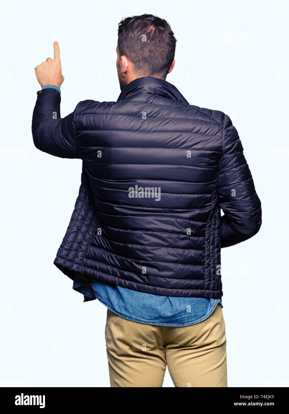 Man coat back looking up hi-res stock photography and images - Alamy