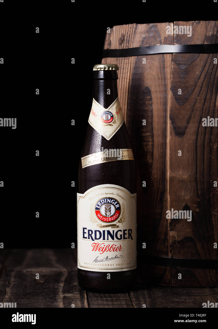 LONDON, UK - JULY 28, 2018: Bottle of Erdinger wheat beer next to ...