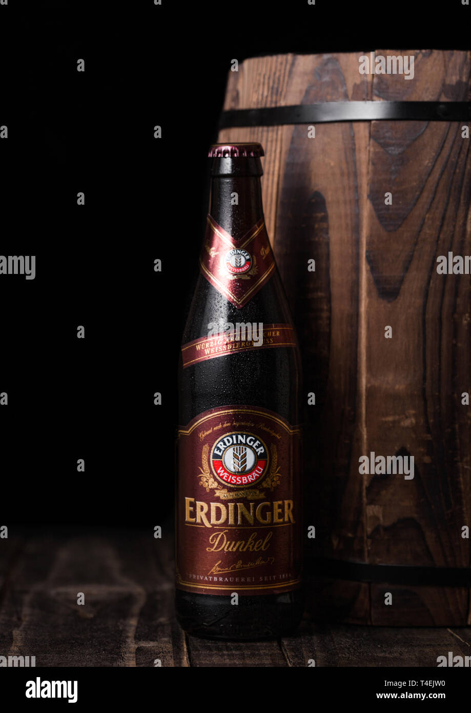 LONDON, UK - JULY 28, 2018: Bottle of Erdinger Dunkel beer next to ...