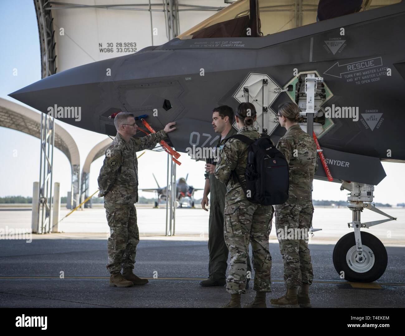 Chief Master Sgt. Gregory Smith, command chief of Air Force Special Operations Command receives ...