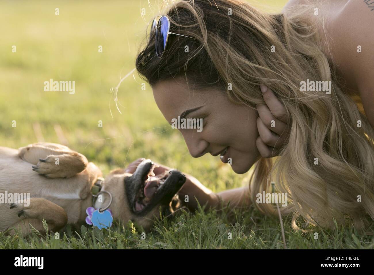 Erin Swisher plays with dog, Peanut, at Conder Park in Killeen, Tx, Mar ...