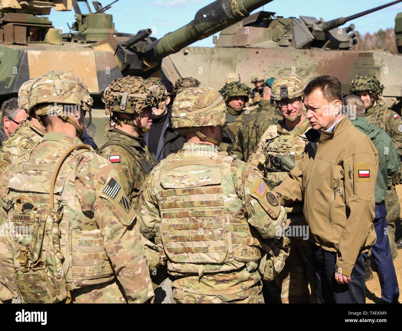 Mariusz Blaszczak, Polish Minister of National Defense, speaks with ...