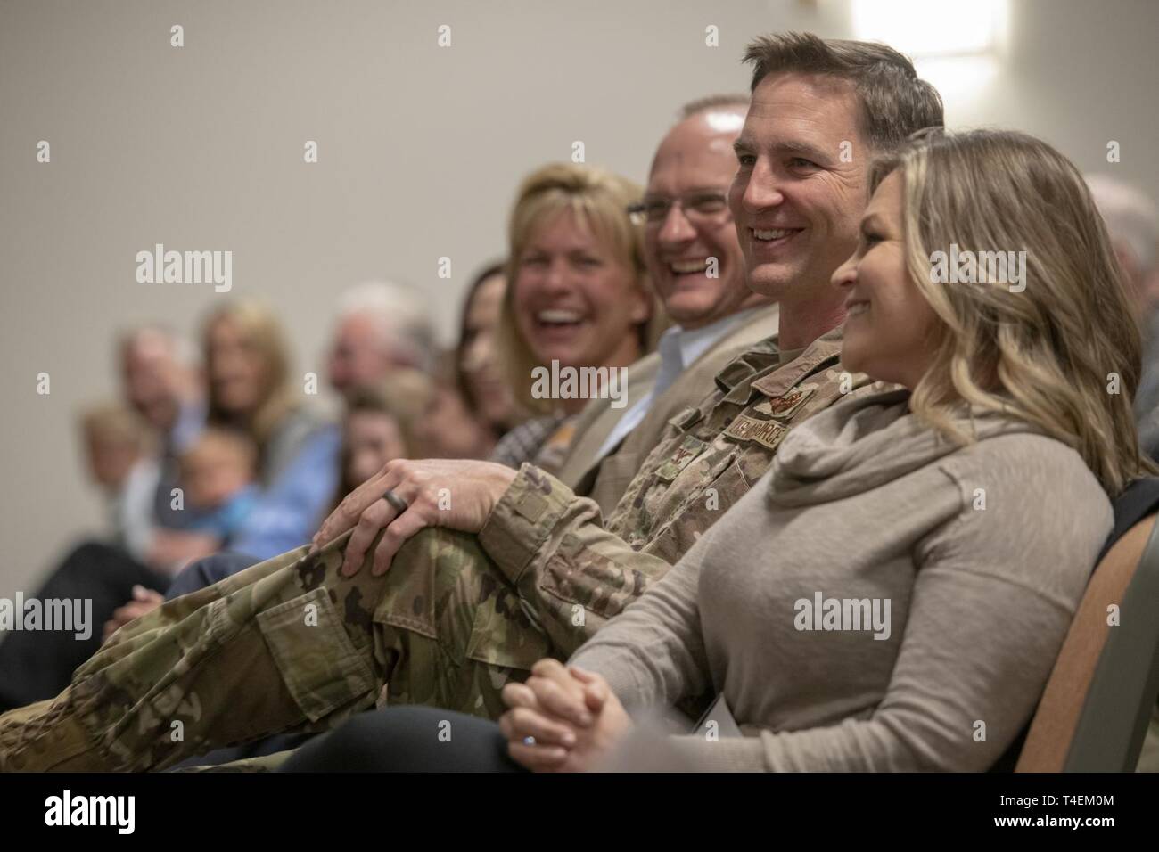 Friends, family and co-workers look on during the 325th Mission Support ...