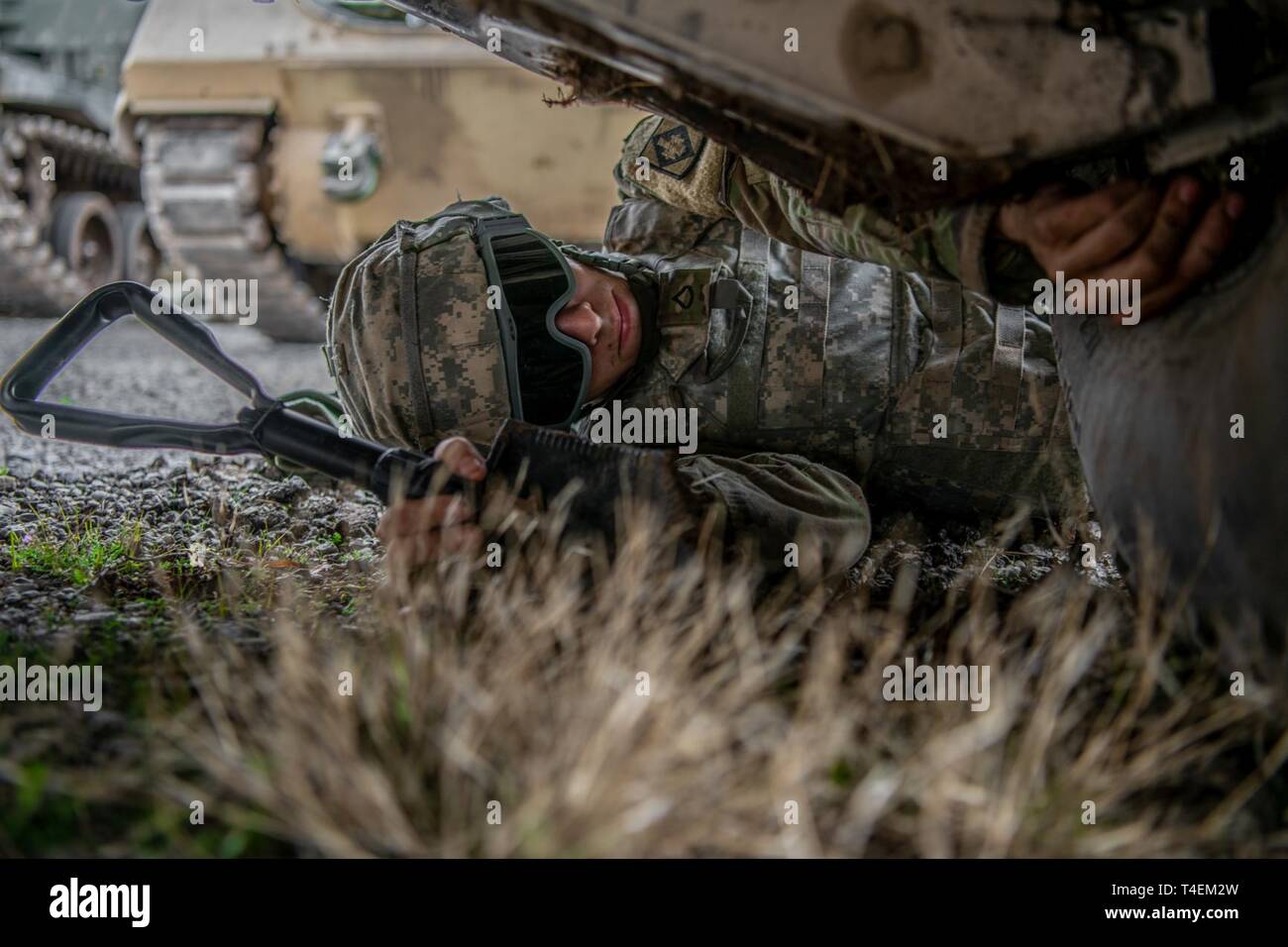 Pfc. Joseph Vosahlo, a multiple launch rocket system crewmember ...