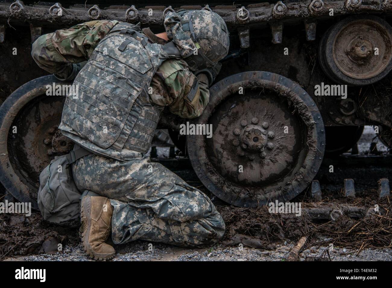 A multiple launch rocket system crewmember assigned to 2nd Battalion ...
