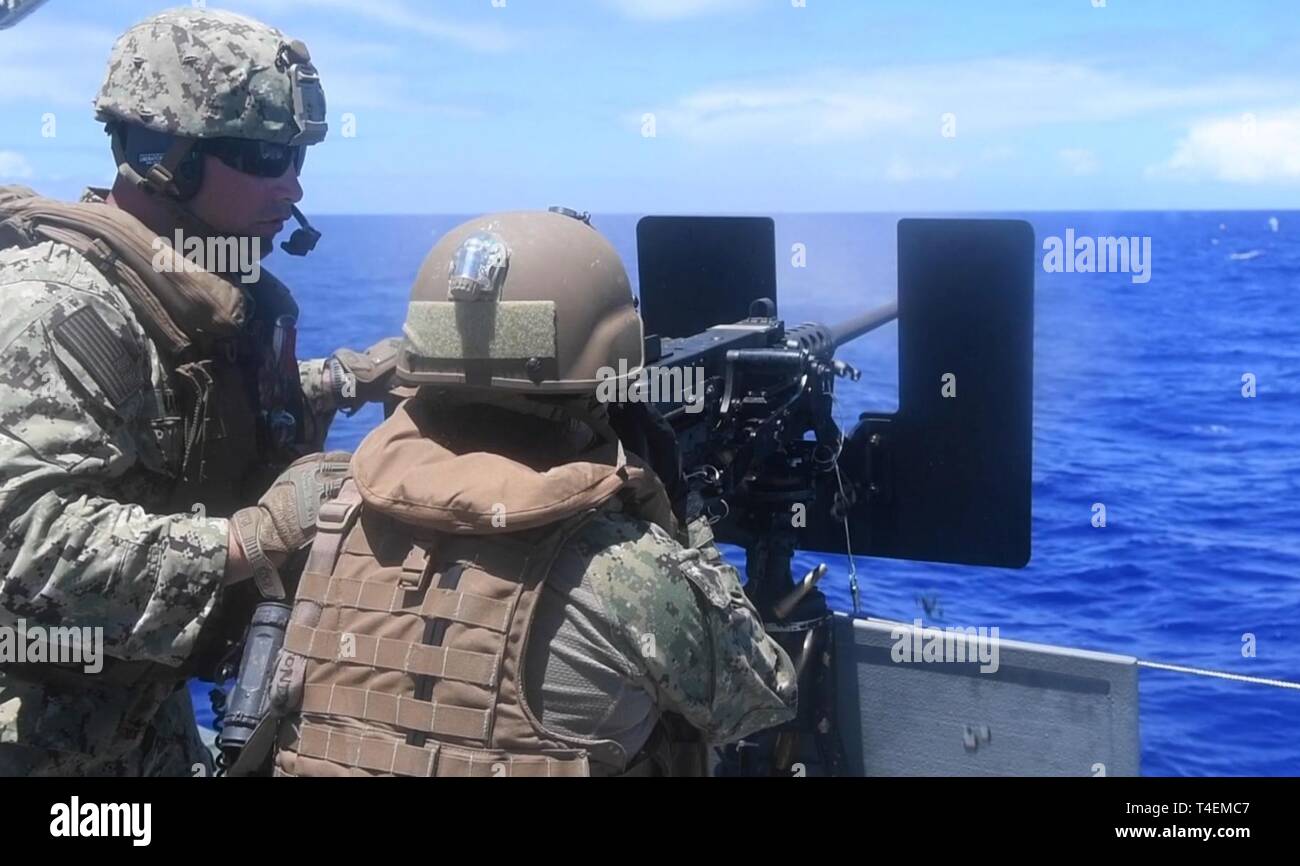 RITA, Guam (March 28, 2019) Gunner’s Mate 2nd Class Conrad Mayo (left ...